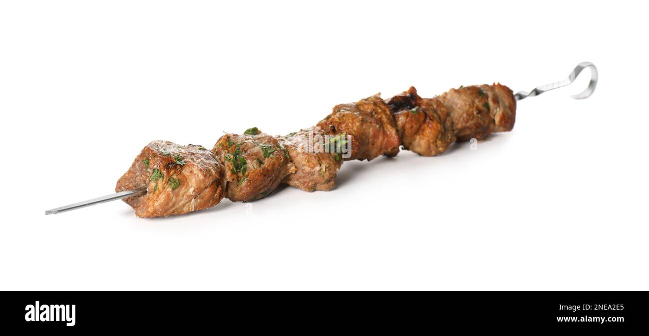 Metal skewer with delicious meat on white background Stock Photo - Alamy