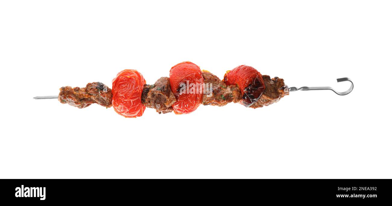 Metal skewer with delicious meat and tomato on white background, top ...