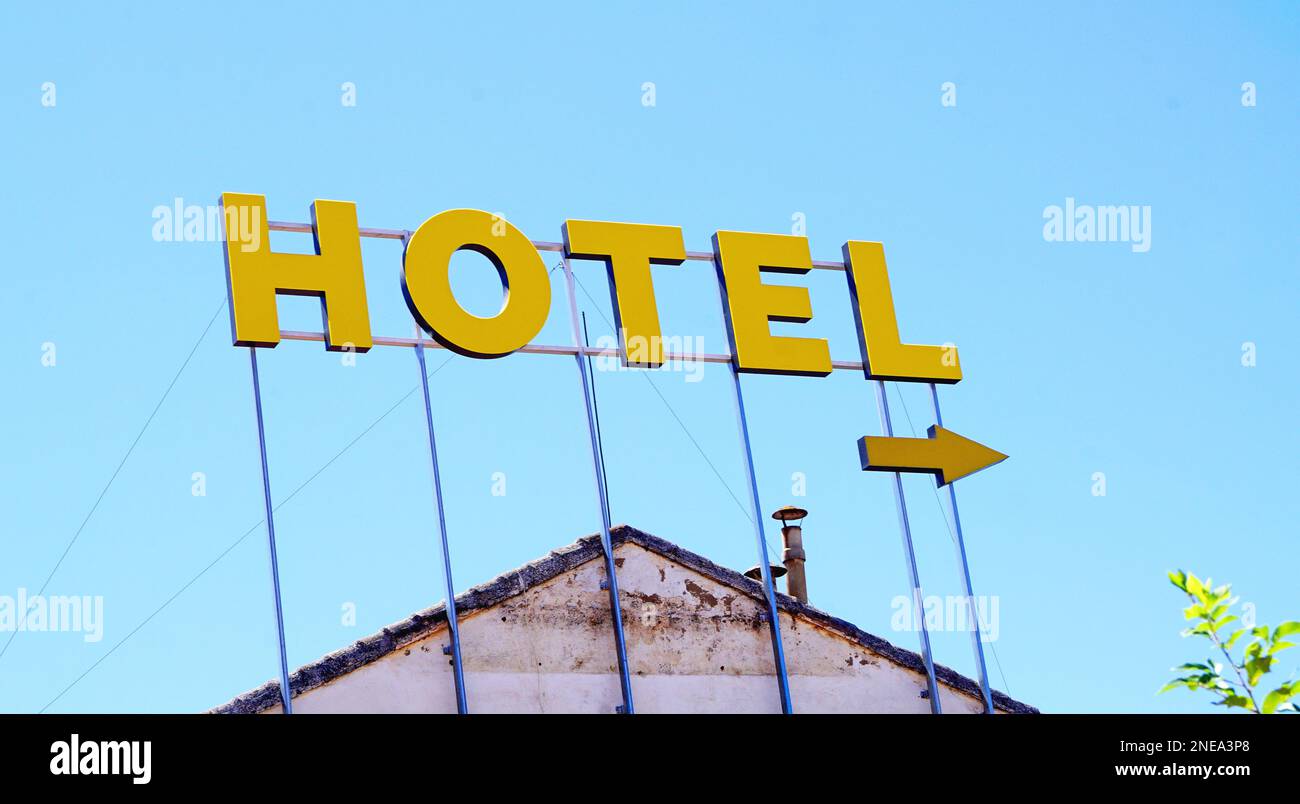 Poster announcing the address of a hotel Stock Photo - Alamy