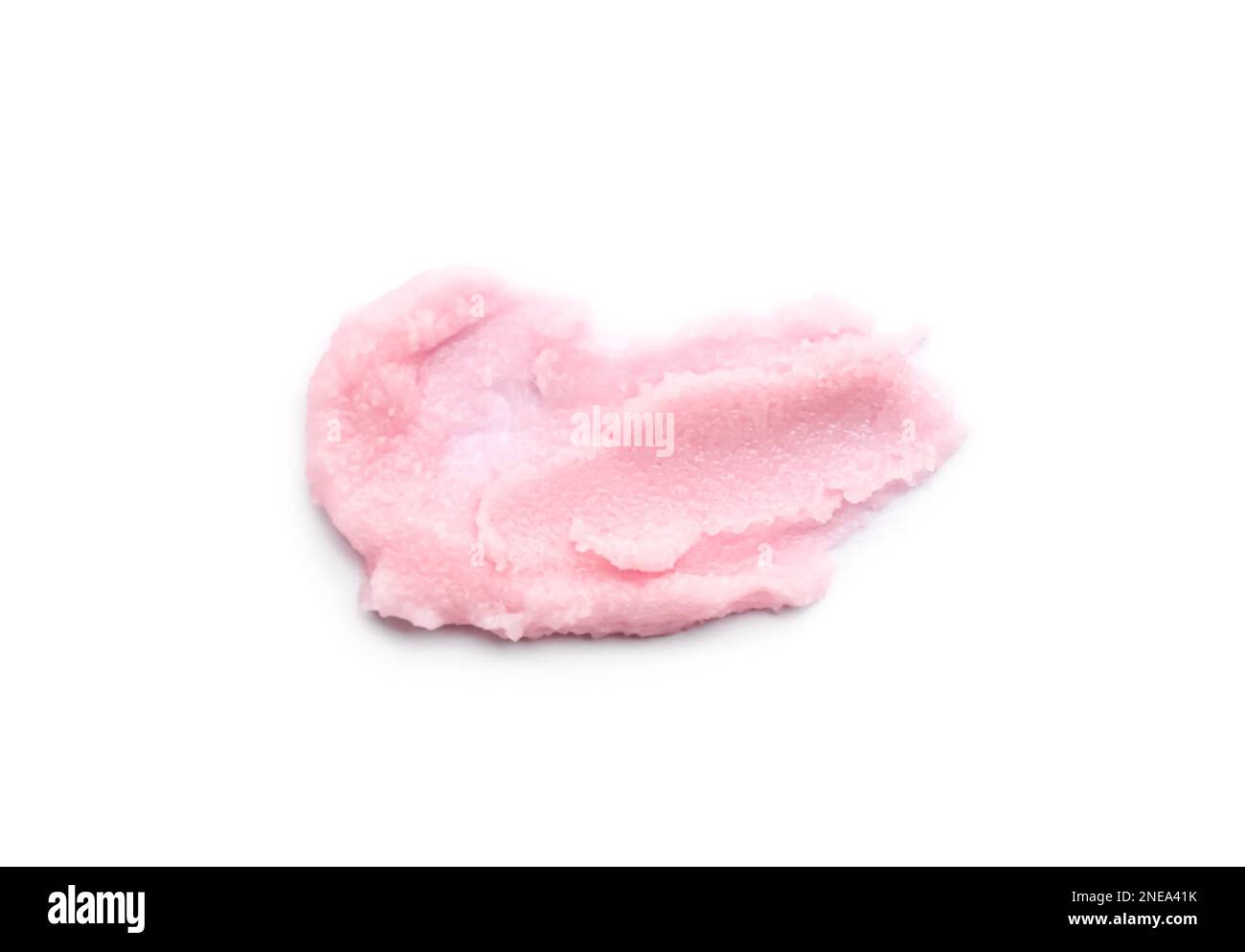 Smear of pink body scrub isolated on white, top view Stock Photo - Alamy