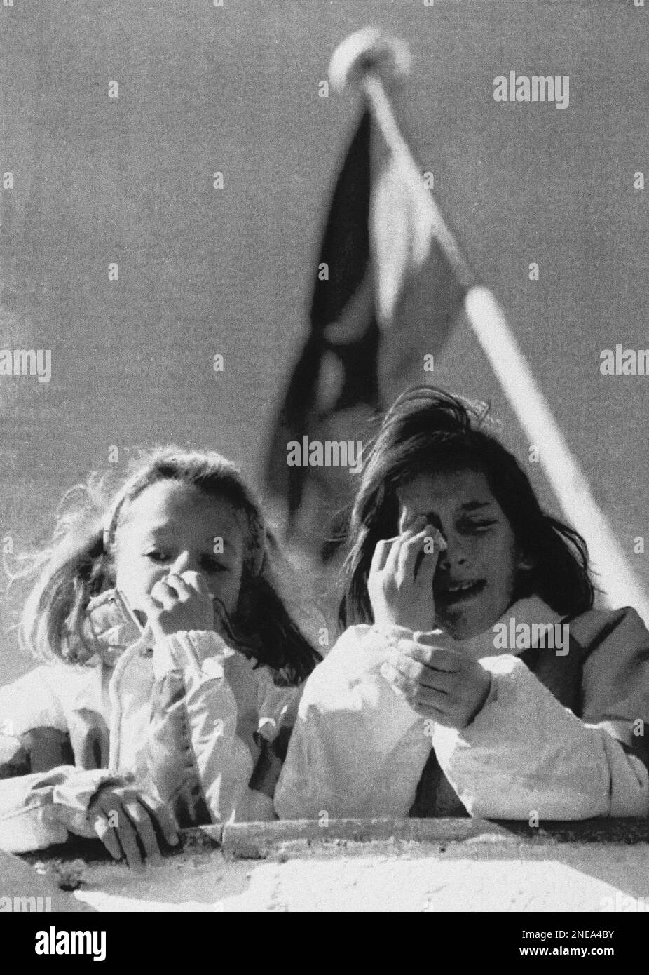 Two girls cry aboard a ship carrying refugees from Dubrovnik on Sunday ...