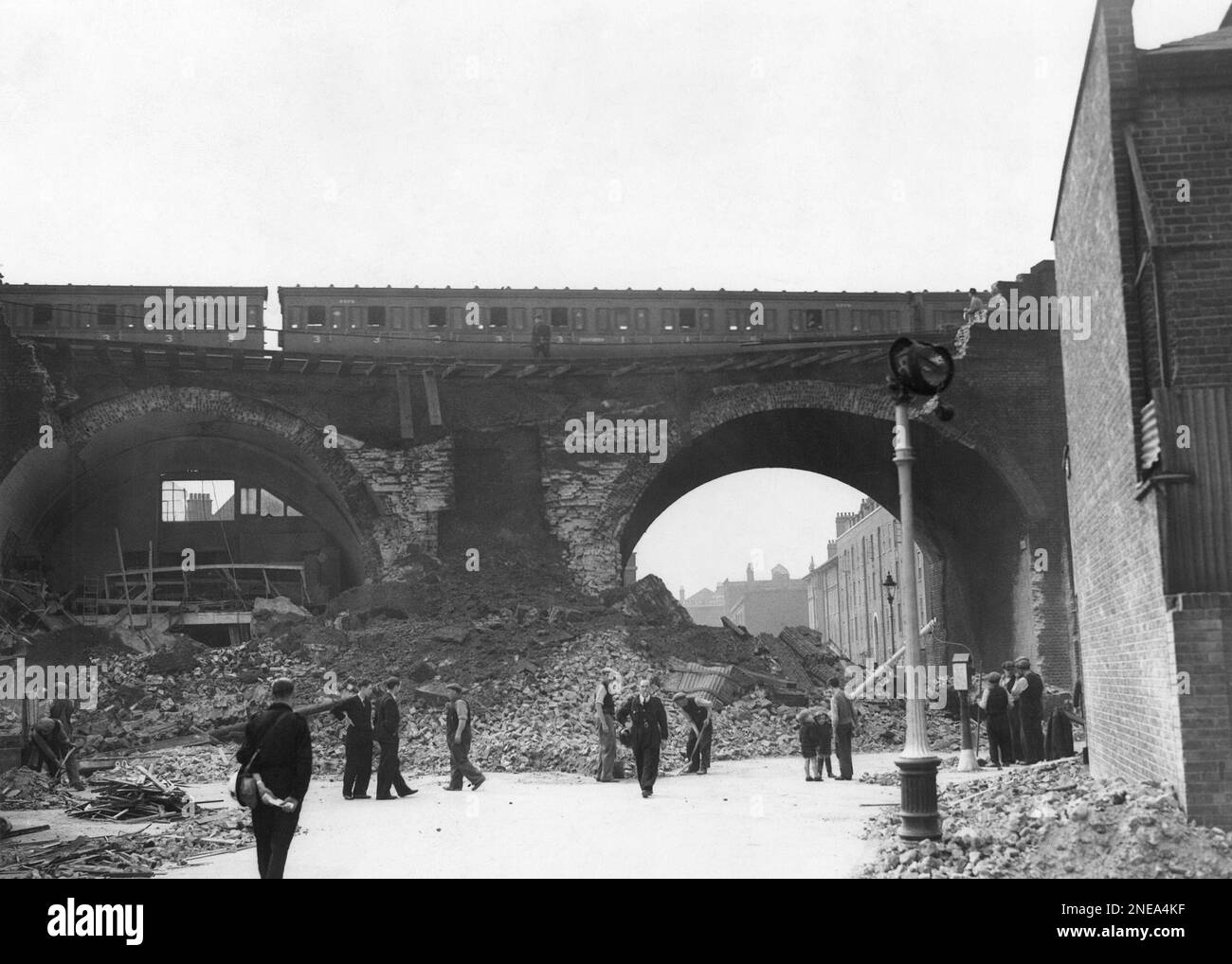 A passenger train running over the arches of the Southern railway ...