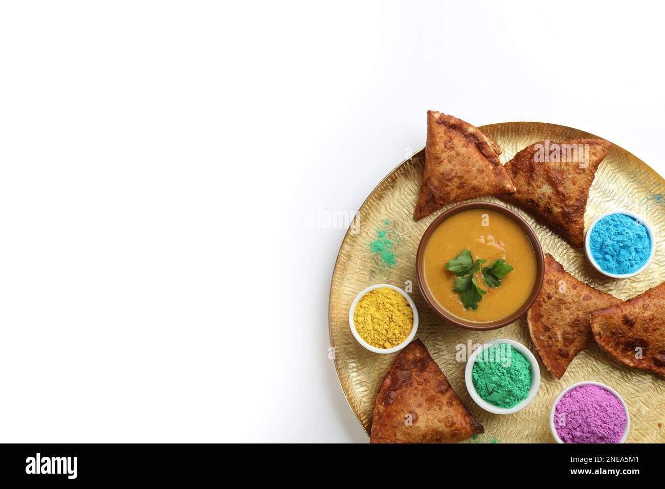 Top view of traditional Indian food and color powder dyes on light ...