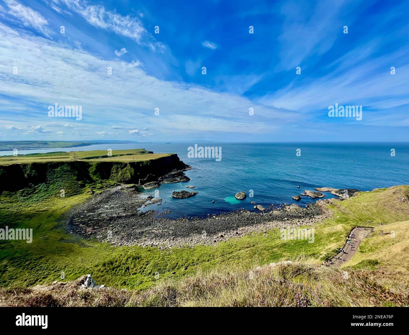 The beautiful view of green cliffs and blue sea. Ireland Stock Photo ...