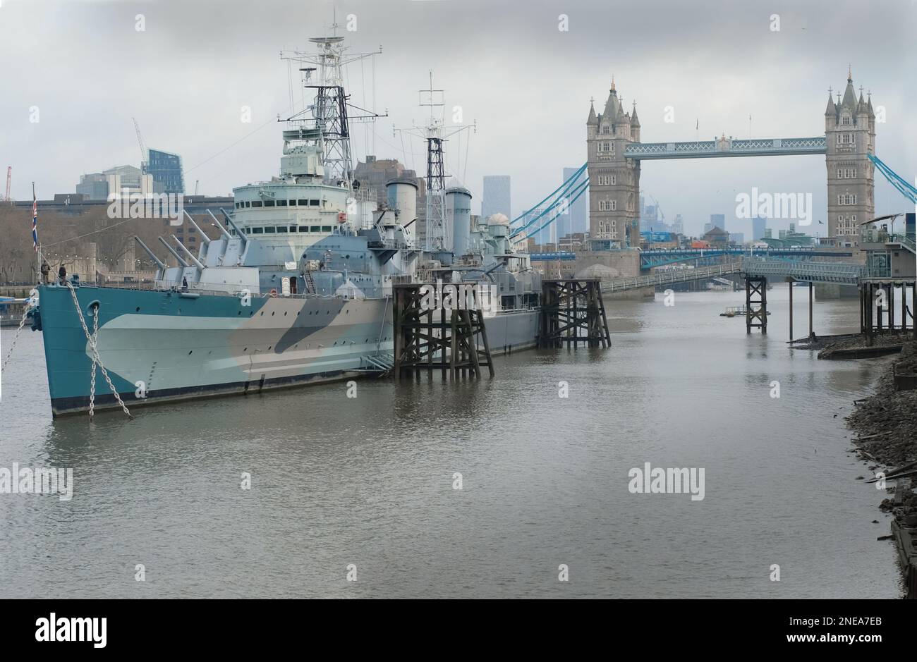 HMS Belfast on the River Thames with Tower Bridge in the background ...
