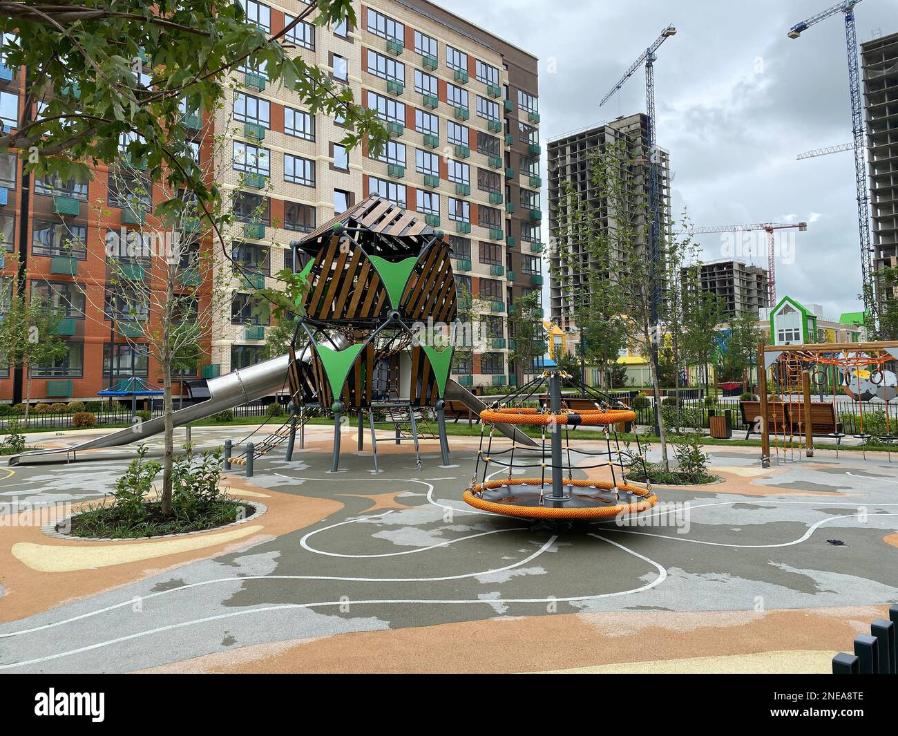 Colorful children's playgrounds in the courtyard of a residential ...