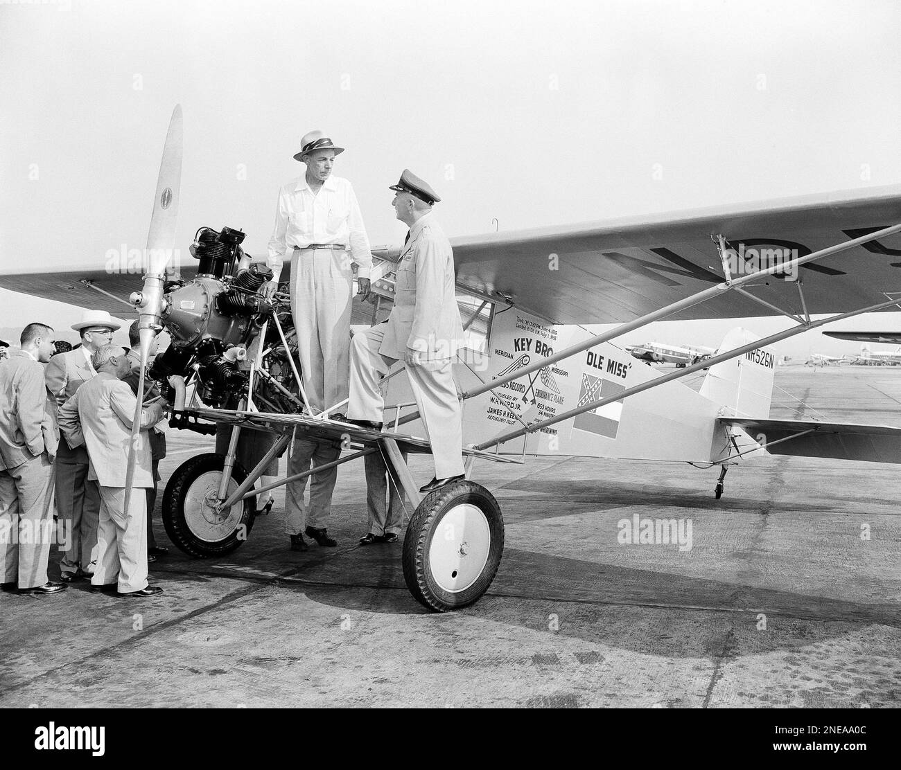 Fred Key is greeted by his brother, Col. Al Key, right, after landing ...