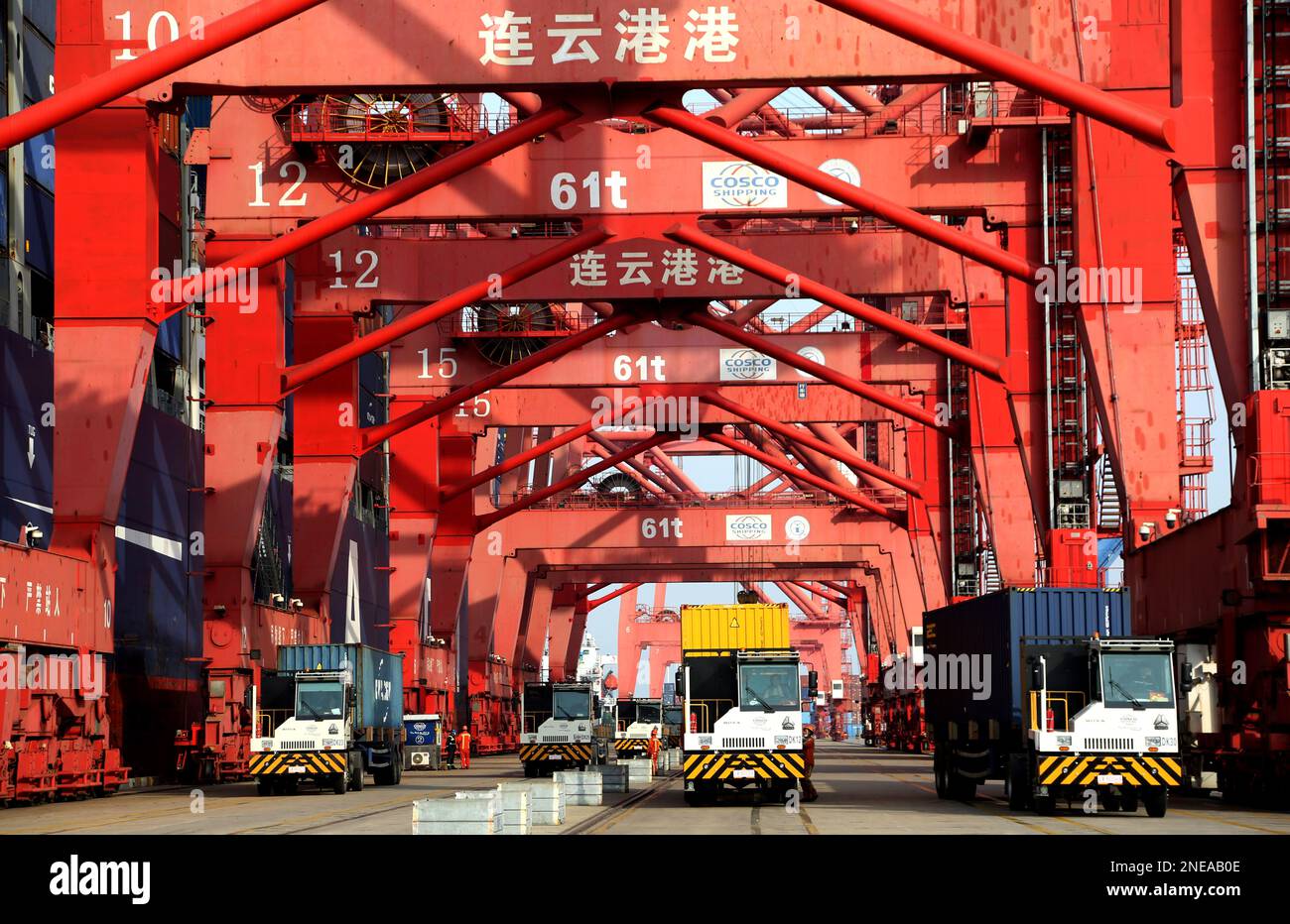 LIANYUNGANG, CHINA - FEBRUARY 16, 2023 - Cargo ships unload containers ...