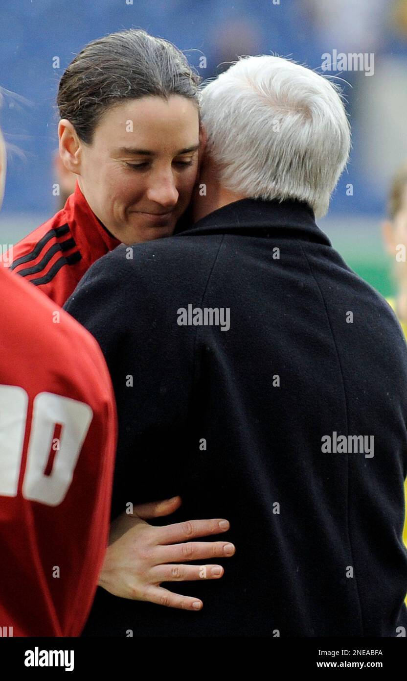 Germany's Birgit Prinz is embraced by German football federation ...
