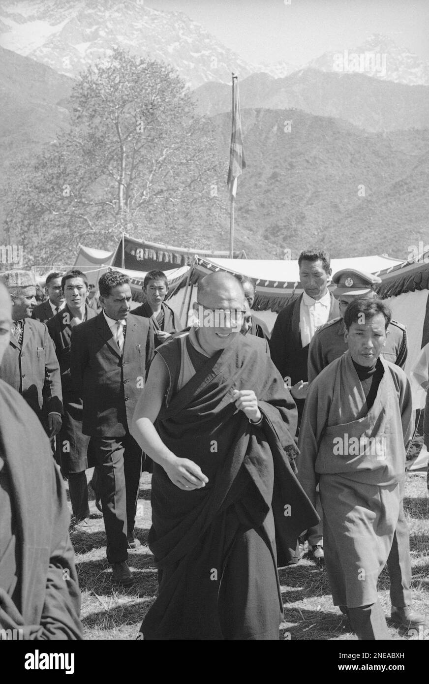 His Holiness the Dalai Lama walking through Dharamsala. The Himalayans ...