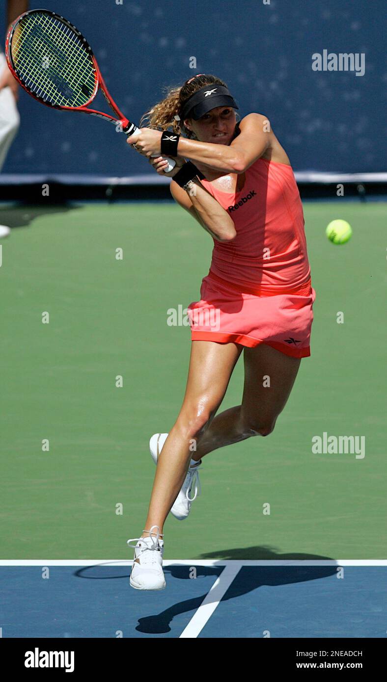 Israel's Shahar Peer returns the ball to Denmark's Caroline Wozniacki ...