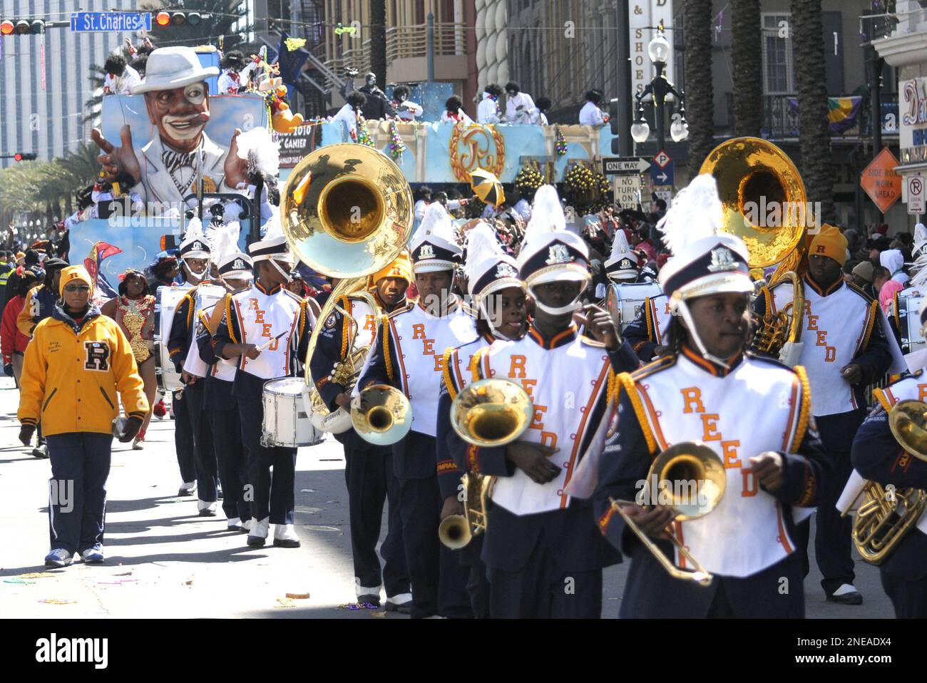 The Sarah T. Reed high school marching band from New Orleans leads the ...