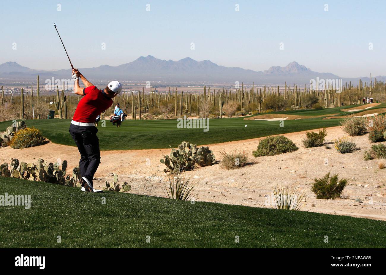 Camilo Villegas, of Colombia, follows through on a shot during a ...