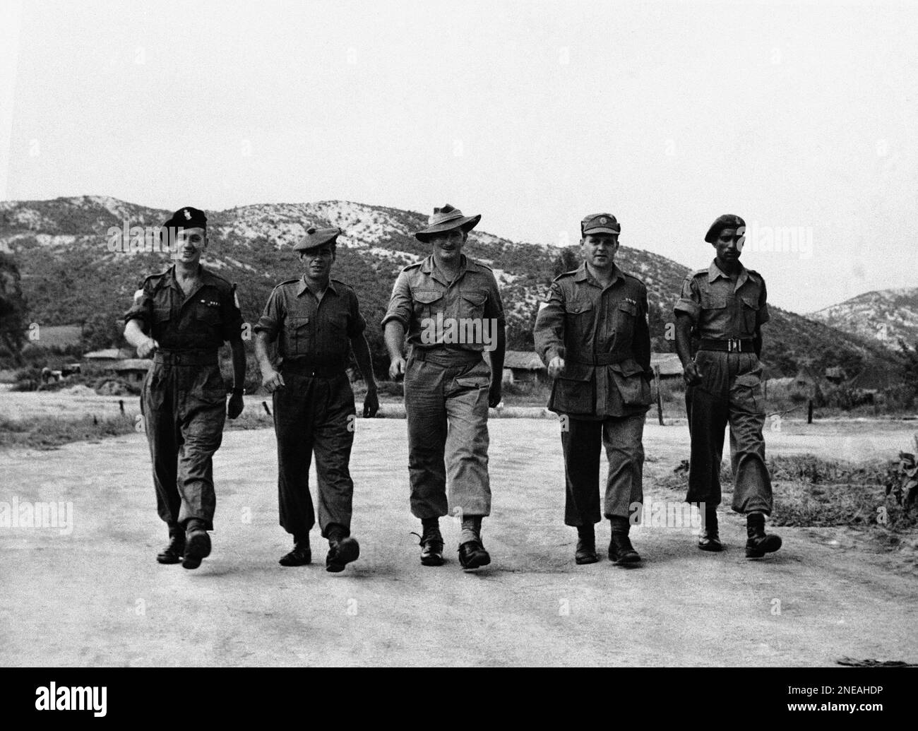 Marching smartly in line, and representing the units that go to make up ...