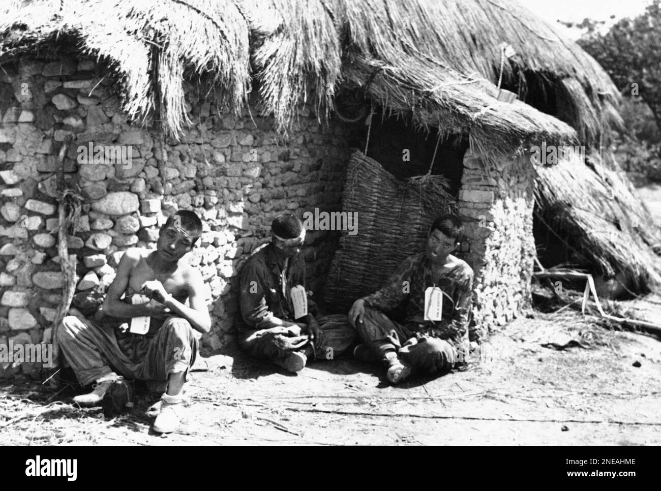 Wounded North Koreans, captured by U.S. Marines, present a picture of ...