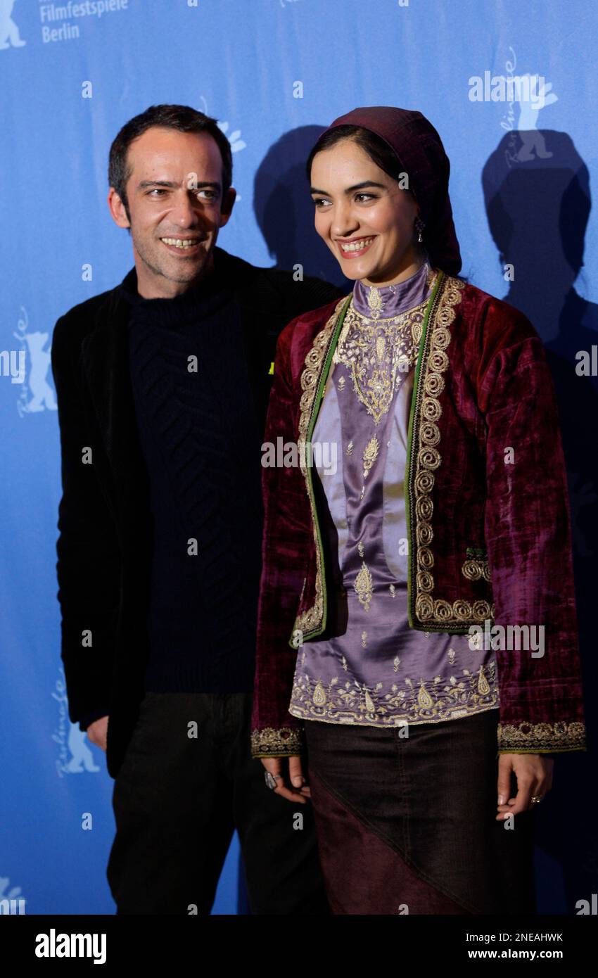 Iranian director Rafi Pitts and Iranian actress Mitra Hajjar poses at ...