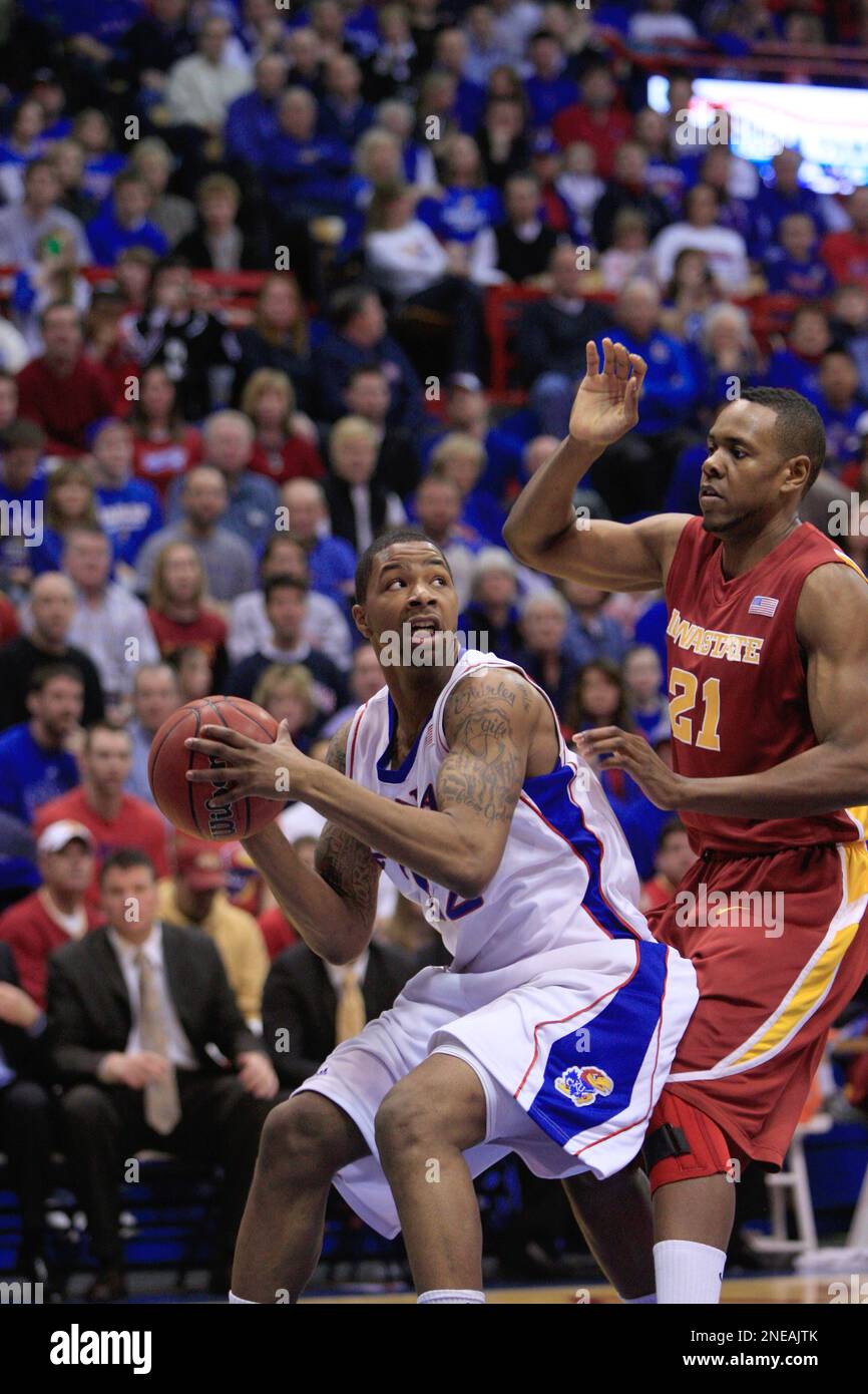 Kansas forward Marcus Morris (22) is covered by Iowa State forward ...