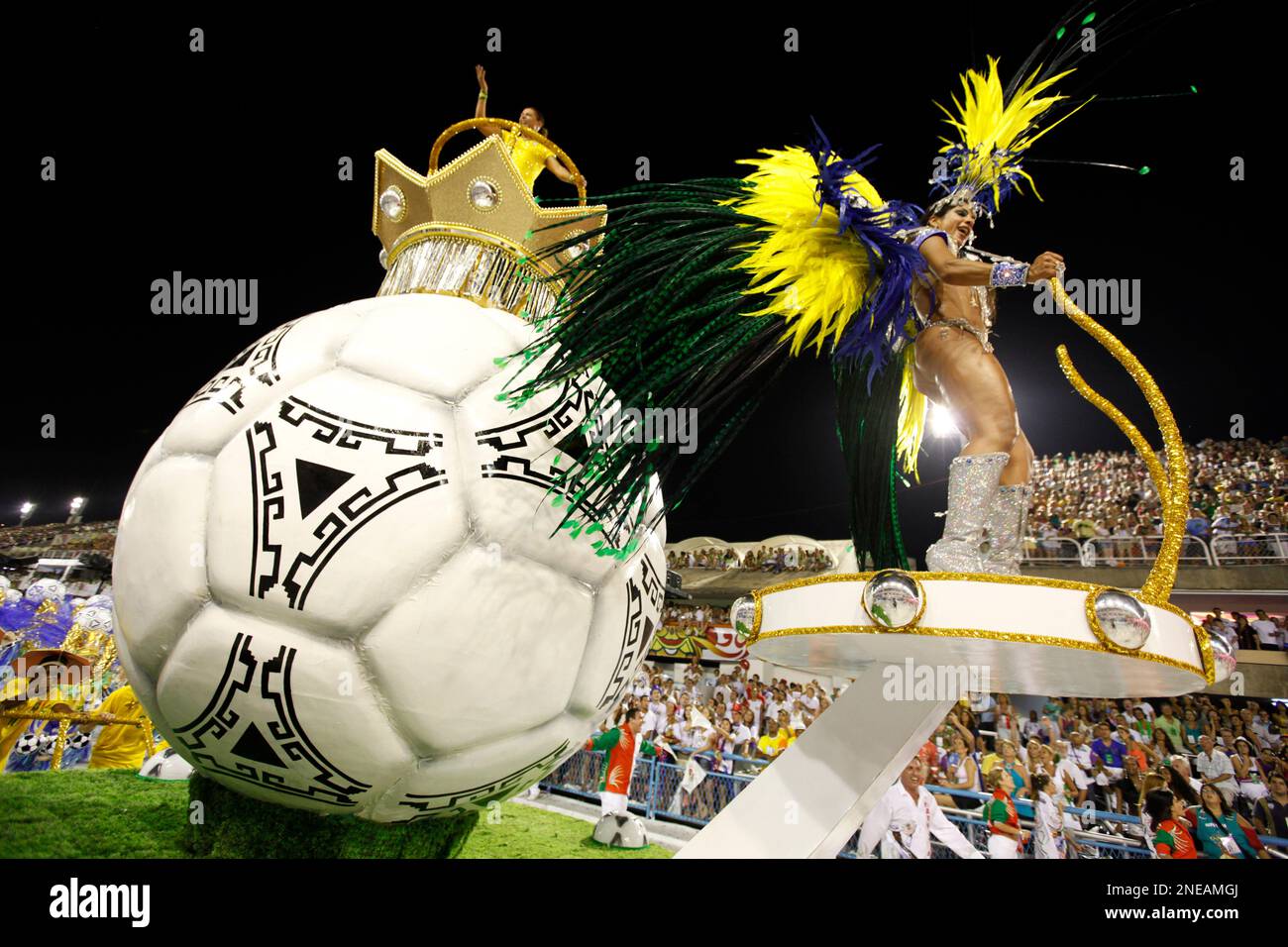 Members of Grande Rio samba school parade on a float during carnival ...