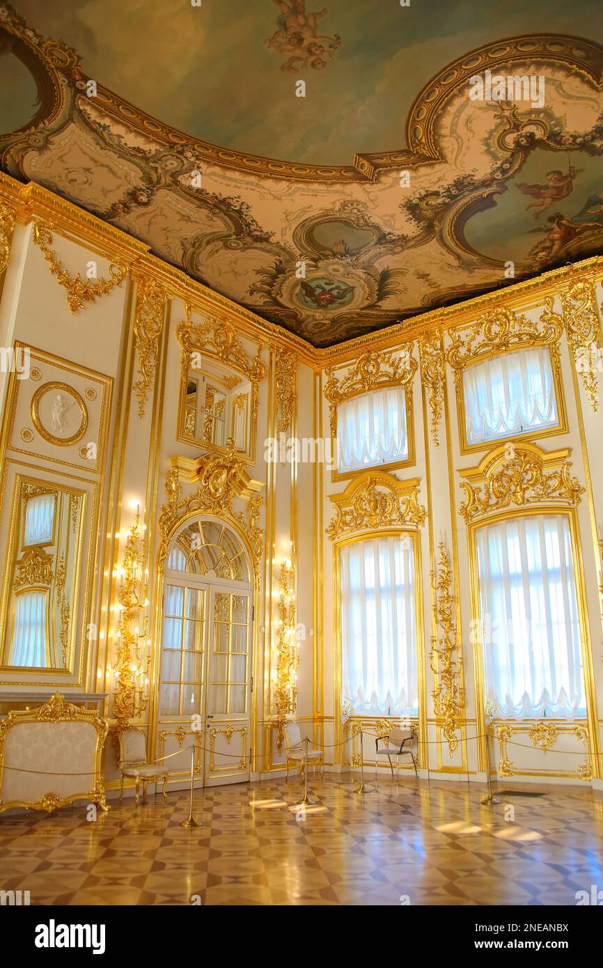 The Grand Ballroom of Catherines Palace, Tsarskoye Selo, Russia A room covered in gold gilding ...