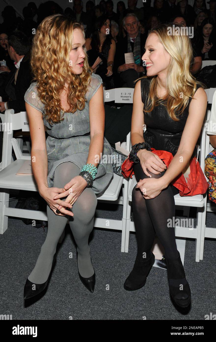 Actresses Julia Stiles, left, and Kristen Bell attend the Tracy Reese ...