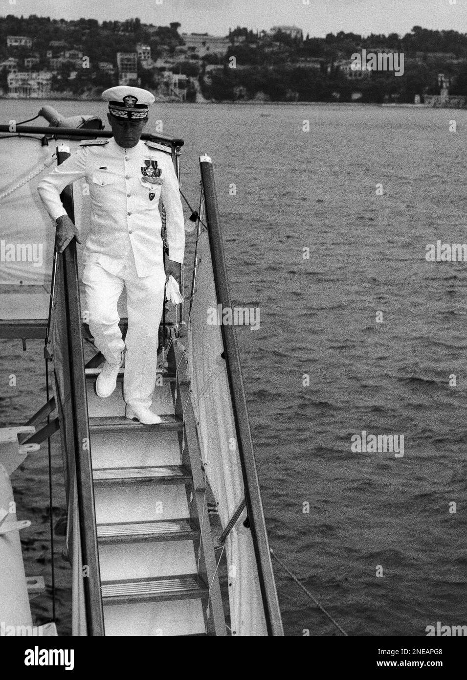 Vice Admiral Charles R. (Cat) Brown, comes down the gangway of the U.S ...