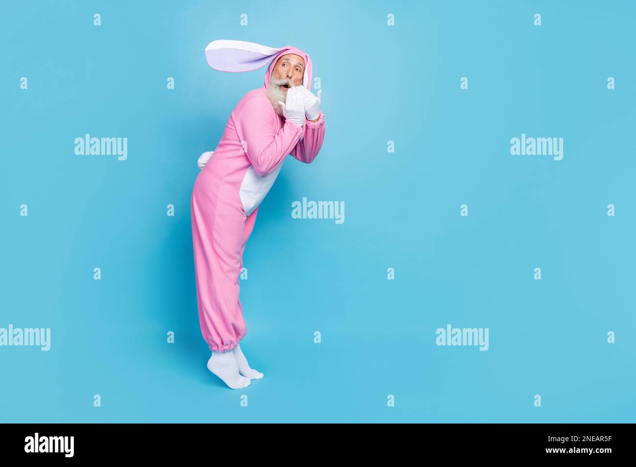 Full length photo of impressed funky retired man wear pink hare pajama ...