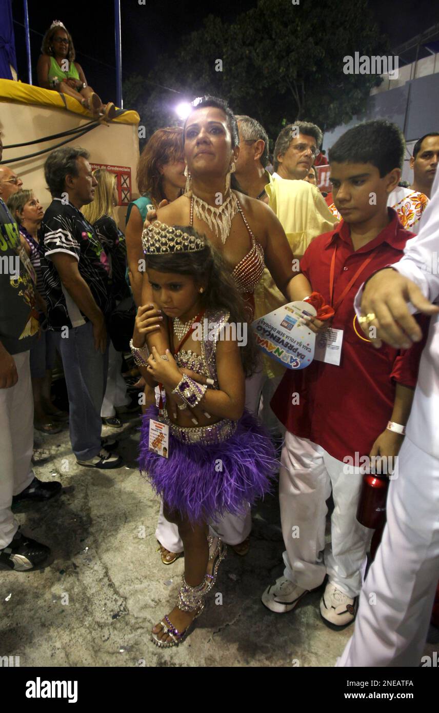 Julia Lira, 7, center, queen of the drums' section of Viradouro samba ...