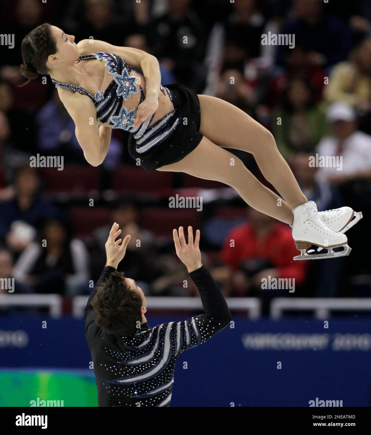 Canada's Jessica Dube and Bryce Davison perform their short program ...