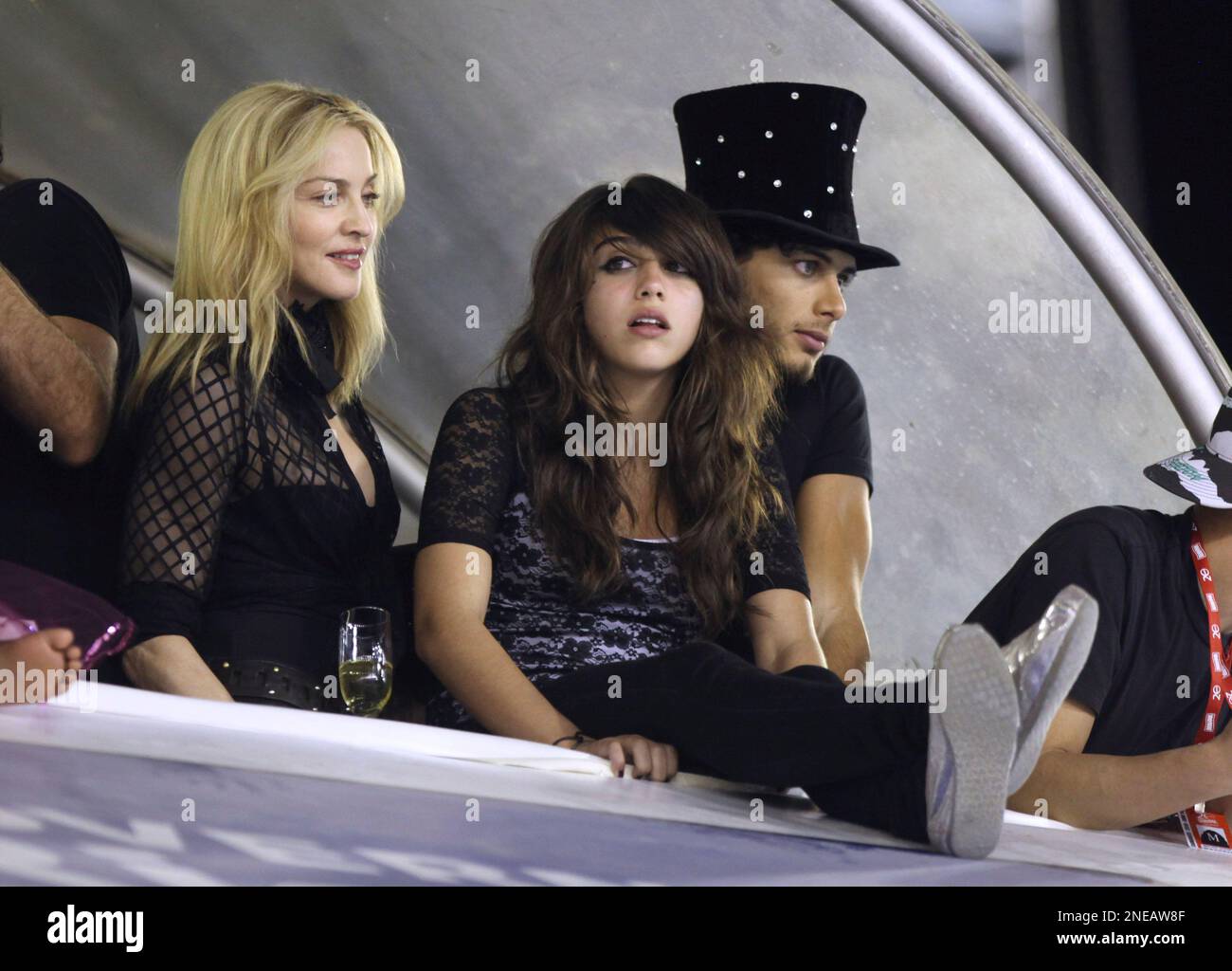 Madonna, left, her daughter Lourdes Maria , center, and Jesus Luz attend the carnival parade at ...