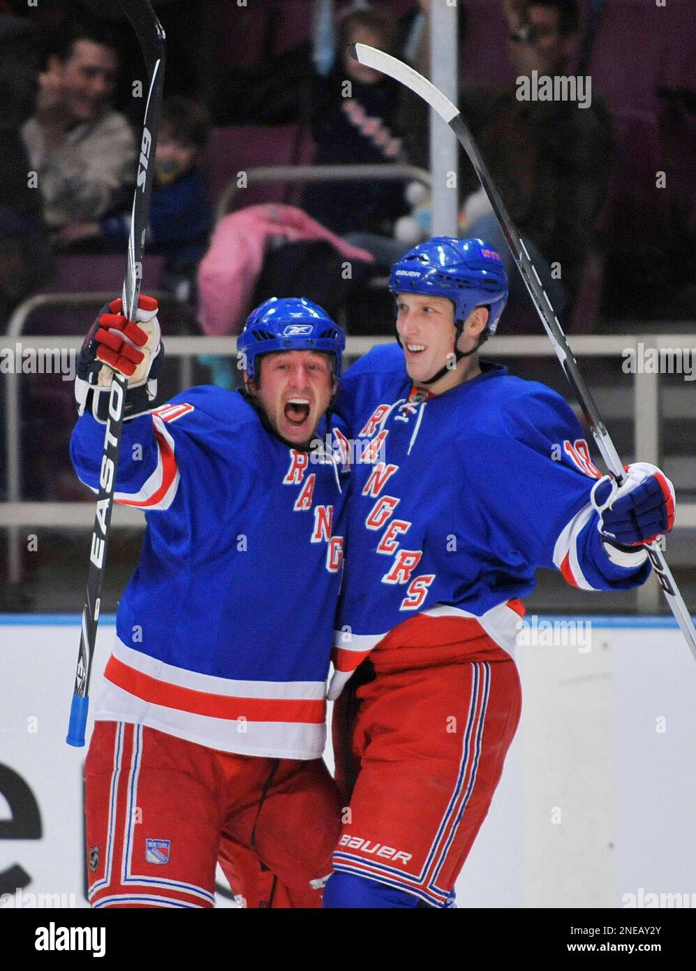 New York Rangers' Vinny Prospal, left, celebrates his goal with ...
