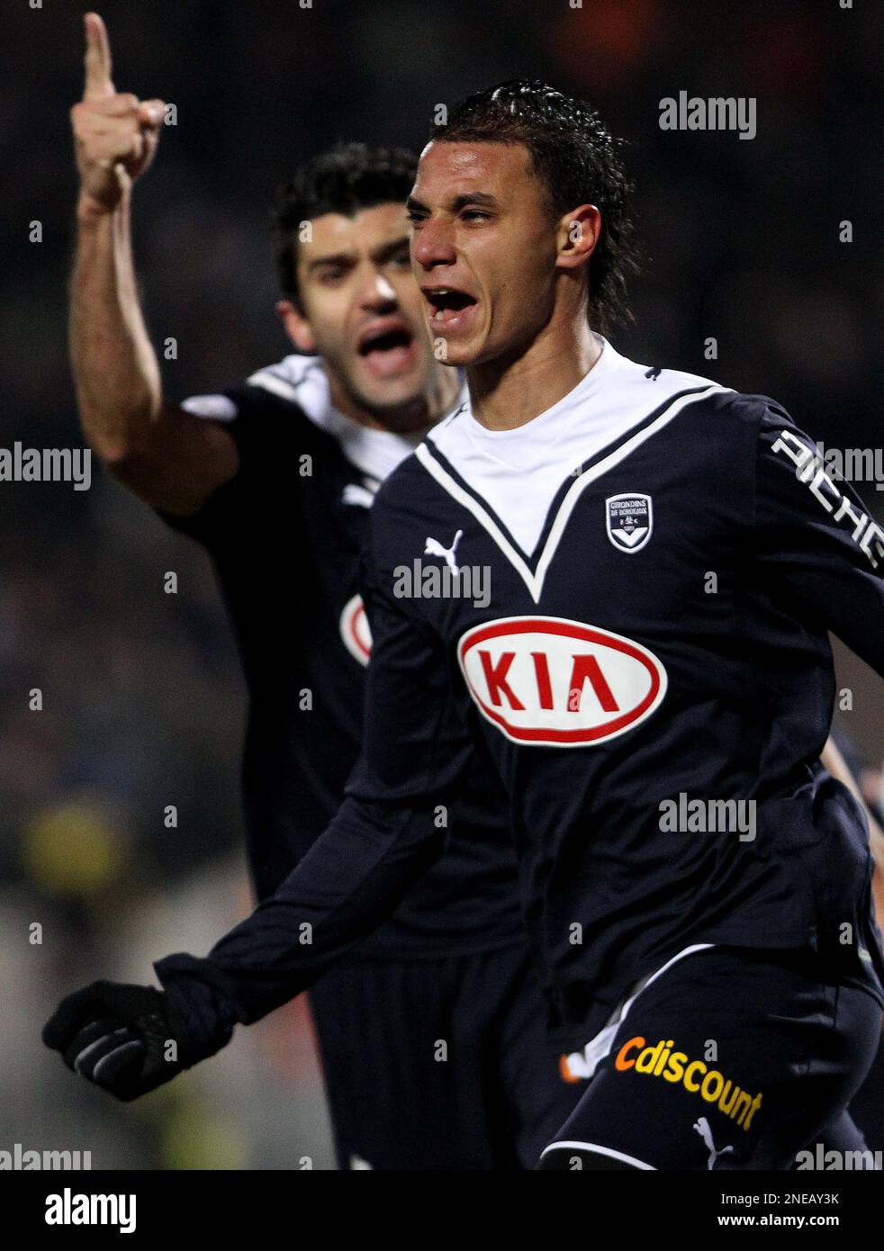 Bordeaux's Marouane Chamakh, foreground, reacts after scoring, with ...