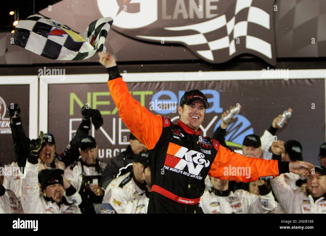 Timothy Peters celebrates in victory lane after winning the NASCAR ...
