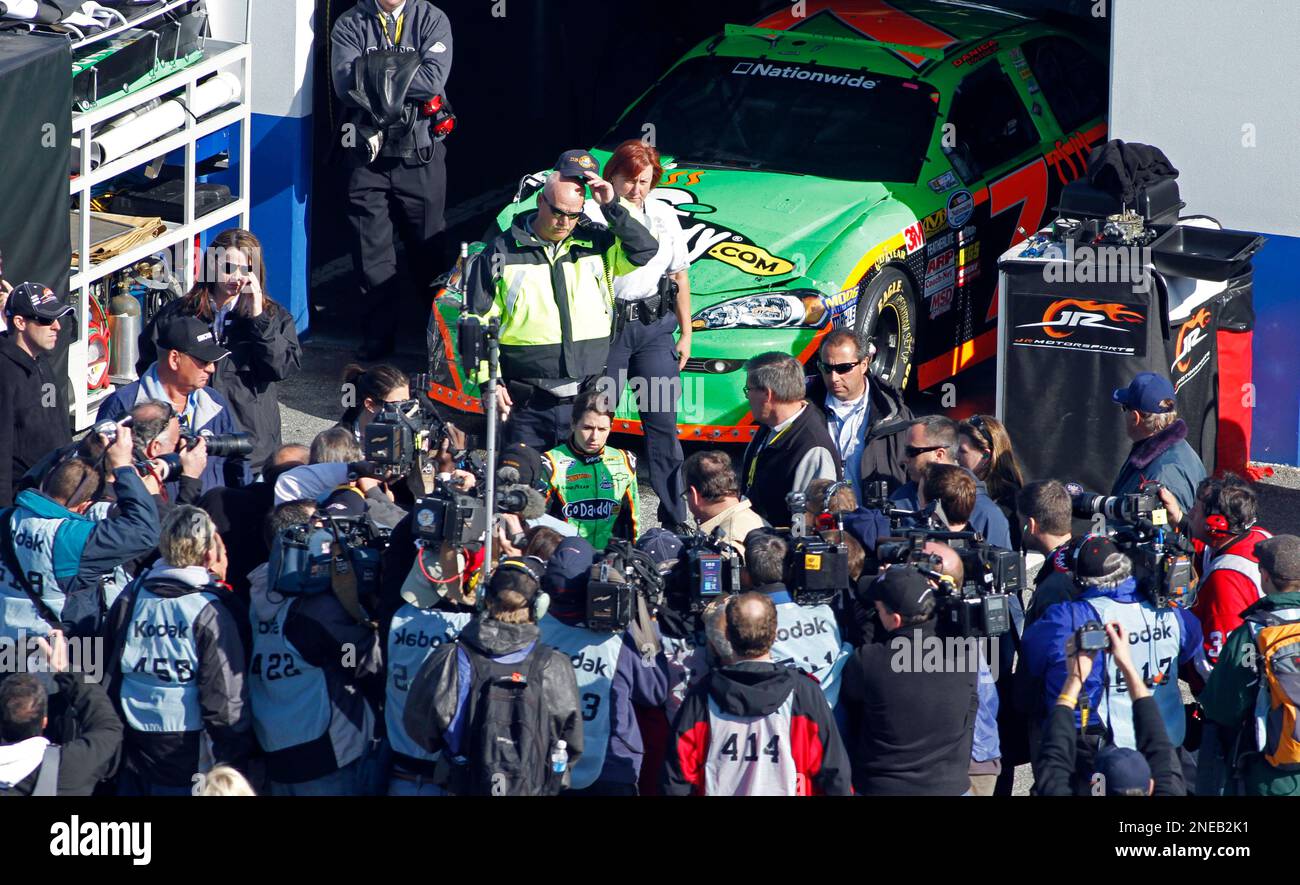 Danica Patrick, center, is surrounded by media after a crash at Daytona ...