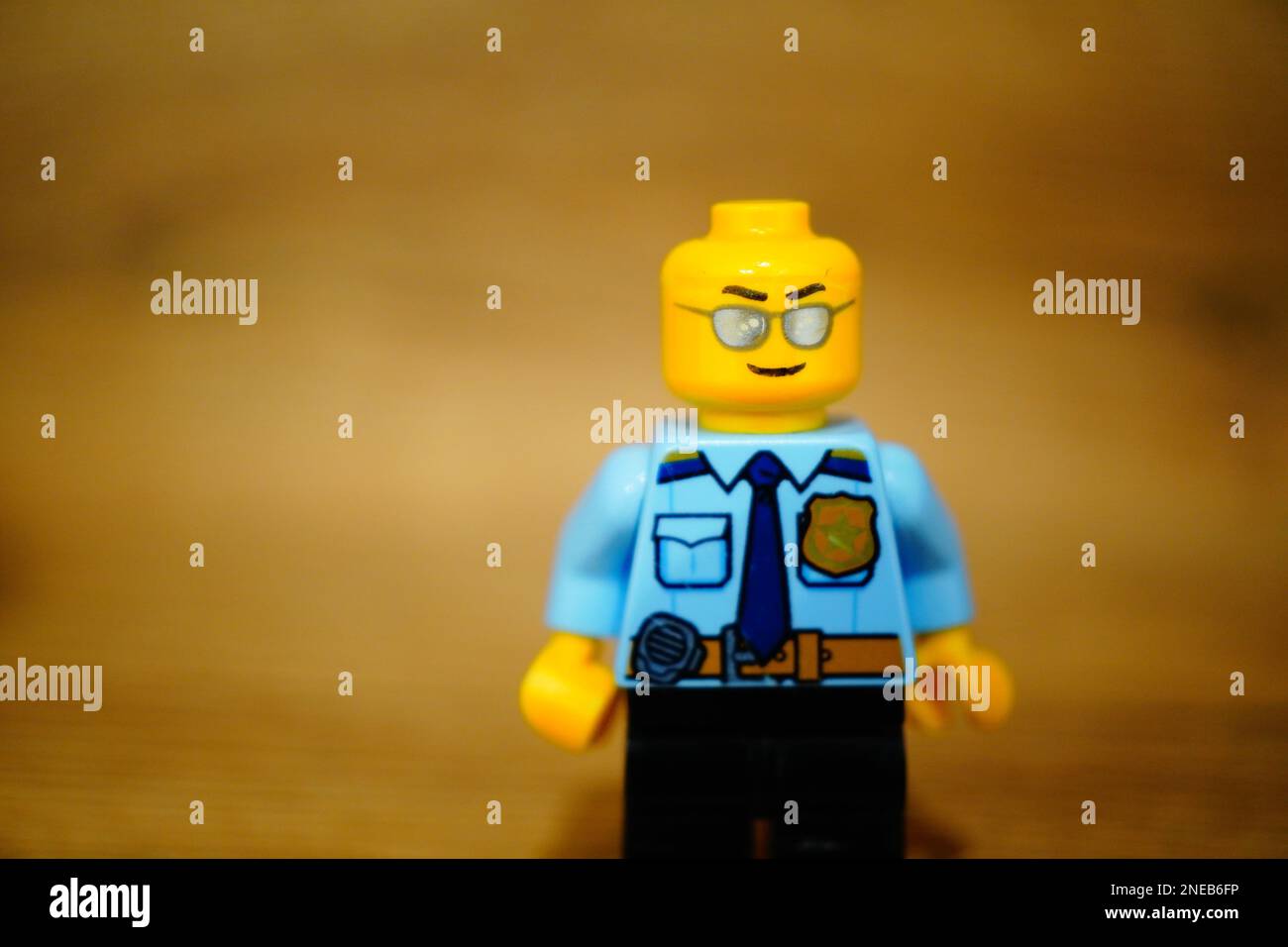 A Lego Police officer with sunglasses and uniform Stock Photo - Alamy