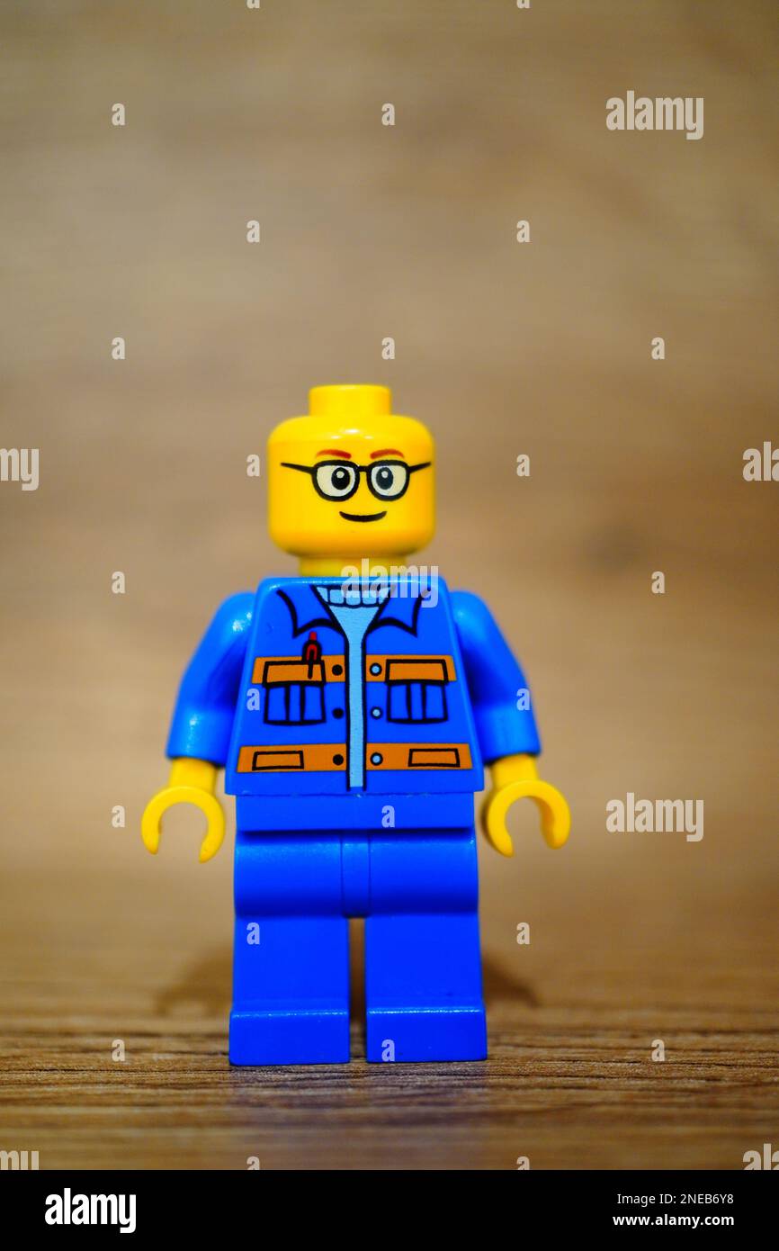 A Lego construction worker figurine with glasses and uniform Stock ...