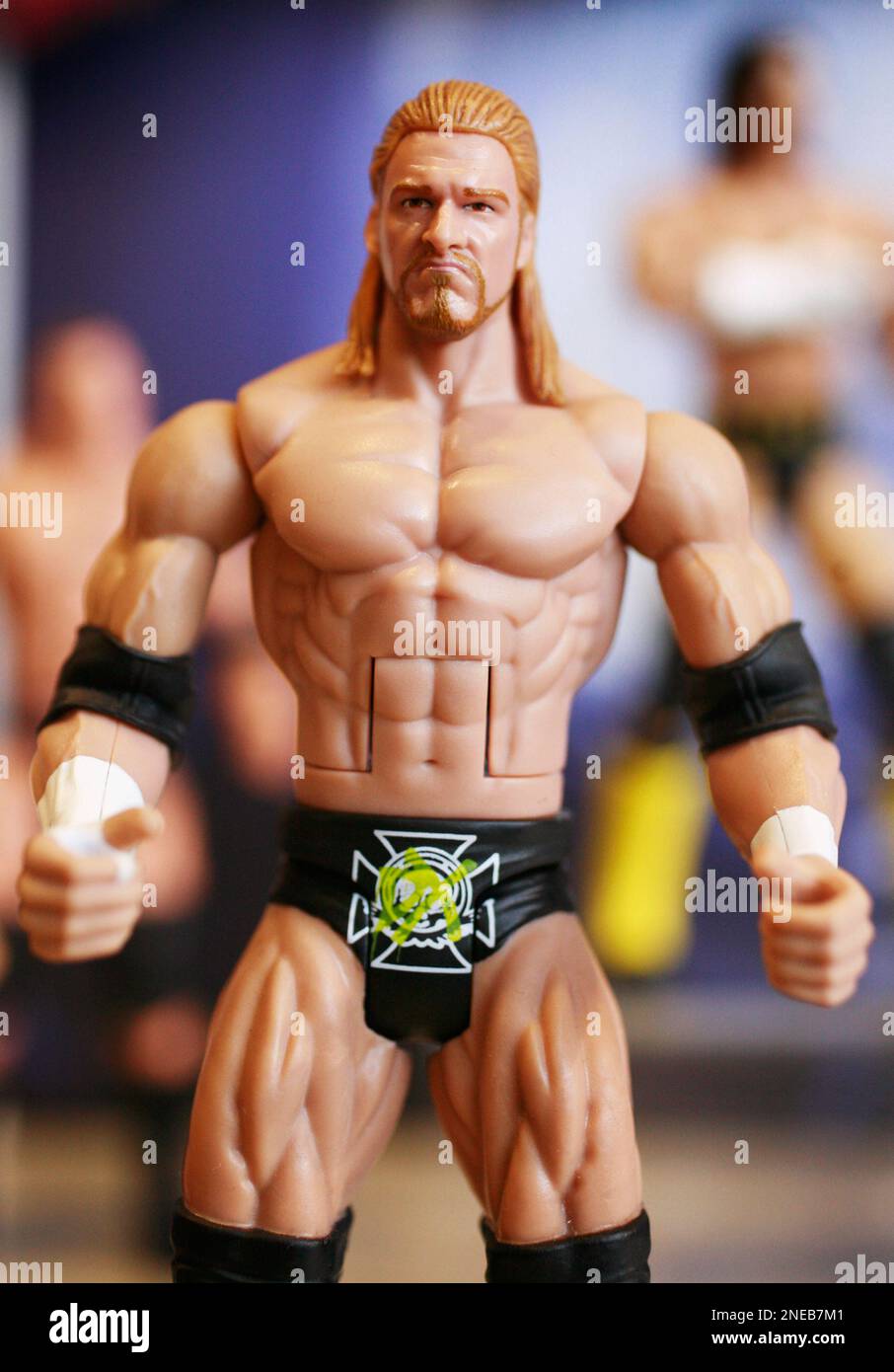 A Triple H superstar wrestler action figure is shown Friday, Feb. 12 ...