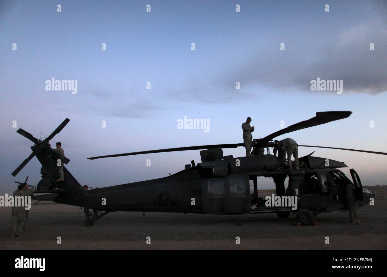 U.S. Army Black Hawk helicopter crew members with the Charlie Company ...