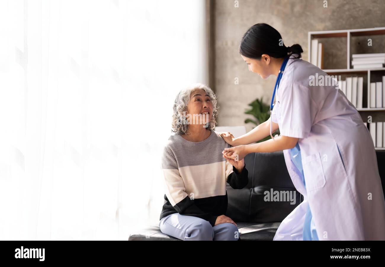 Young Caregiver Helping Senior Woman Walking Nurse Assisting Her Old