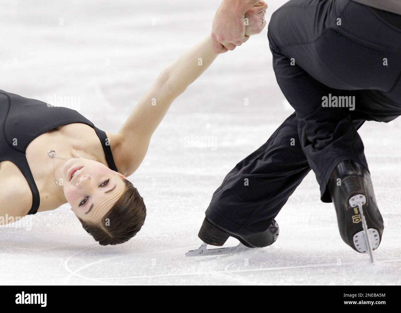 Canada's Jessica Dube and Bryce Davison practice their routine for the ...