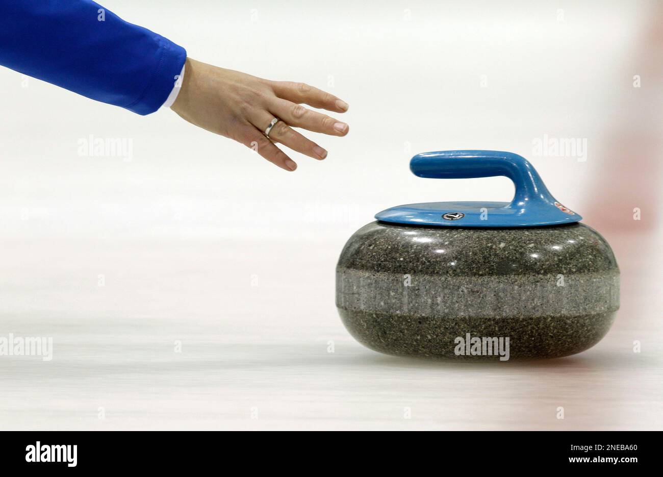 Debbie McCormick releases the rock during a training session of the ...