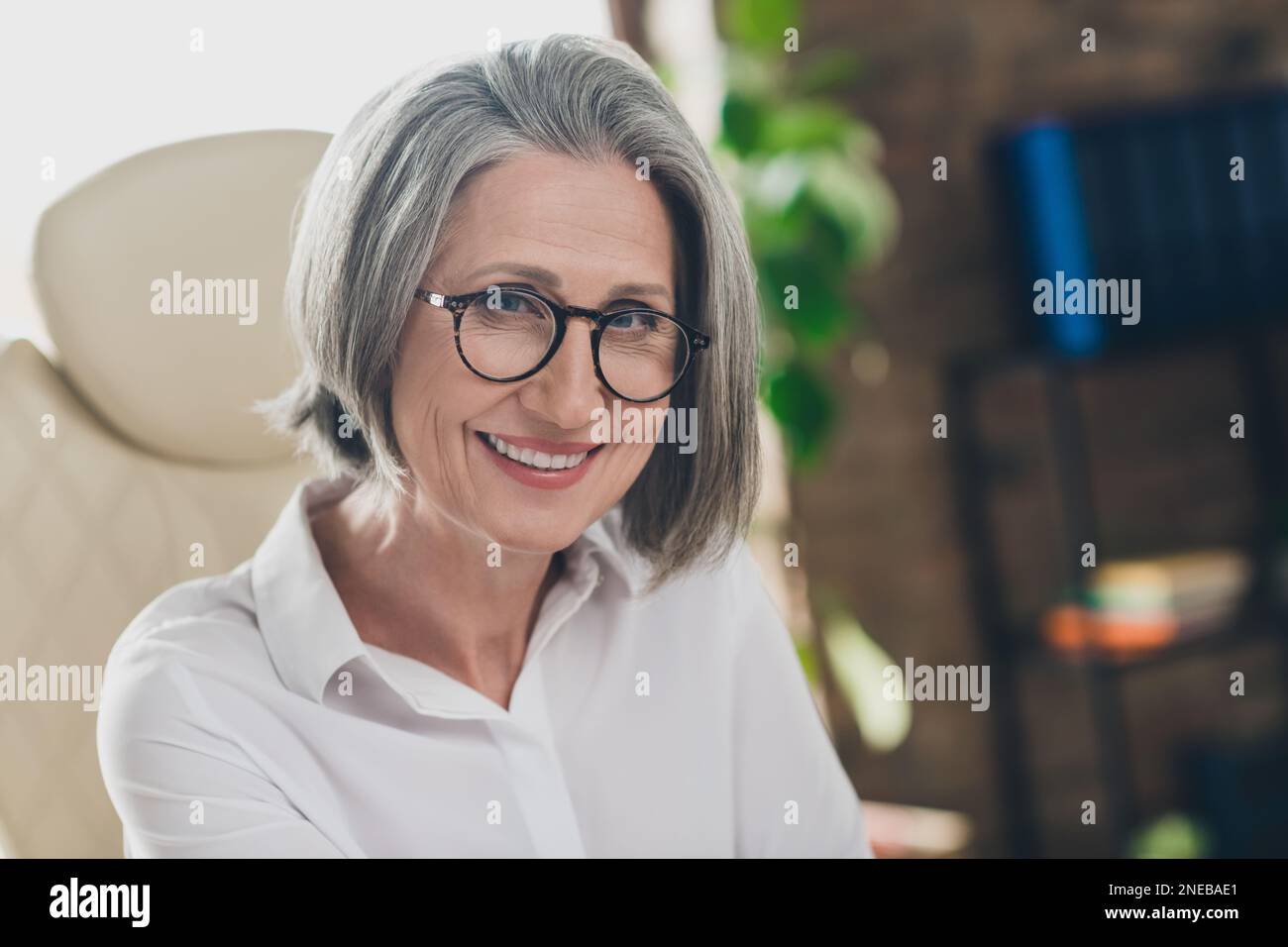 Photo of pretty charming lady realtor wear spectacles white shirt ...