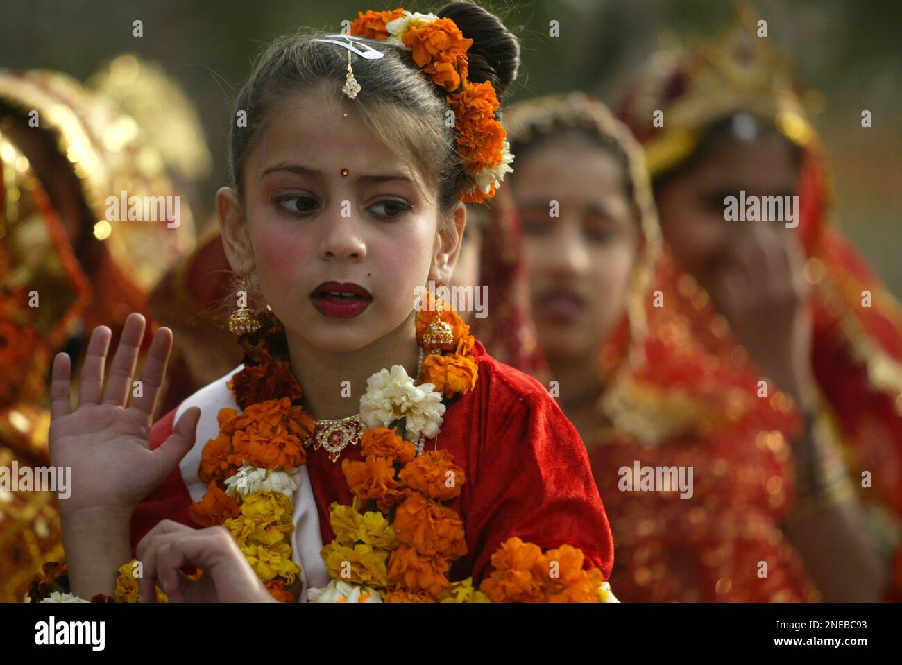 Children dressed as Parvati, the consort of Hindu God Shiva ...