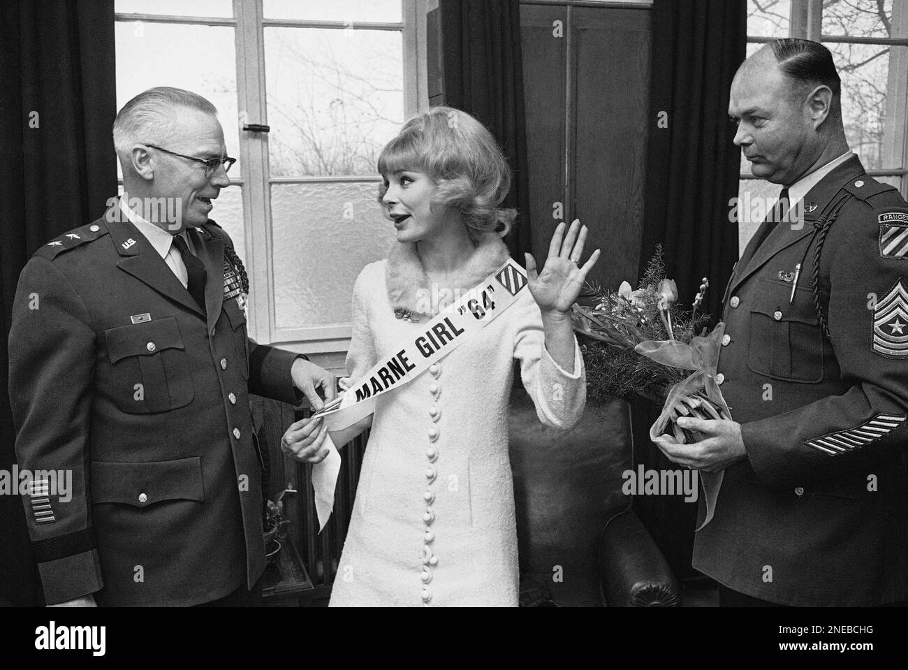 West German actress Elke Sommer is pictured with major general Frank T ...