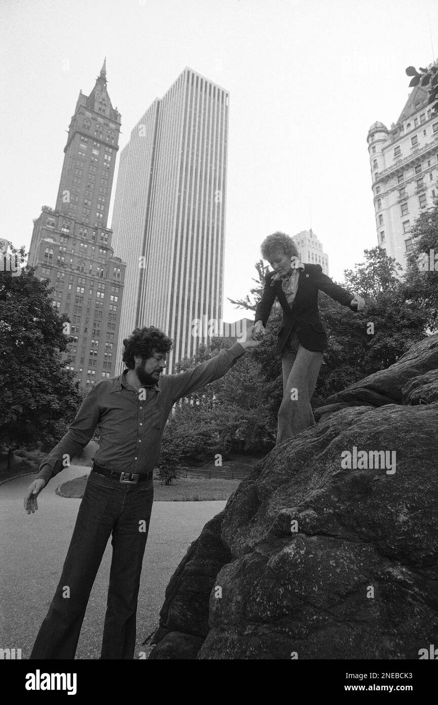 British singer Petula Clark is given a hand by her husband-manager ...