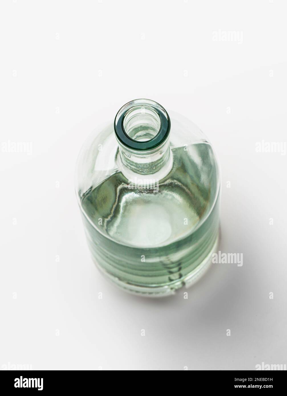 Top view of glass bottle on white background Stock Photo - Alamy