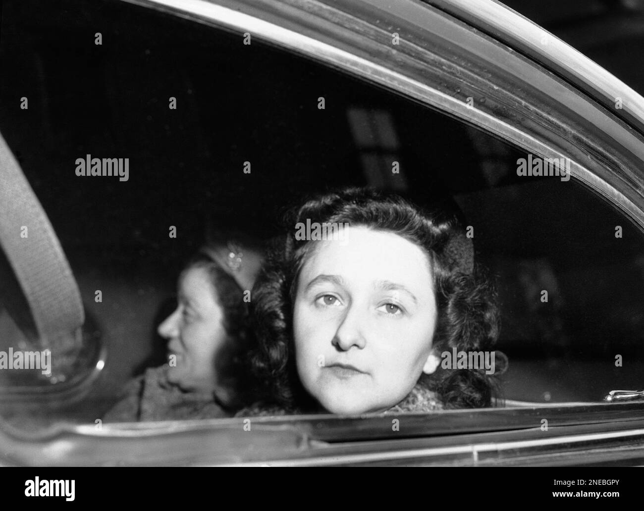 Ethel Rosenberg, wife of Julius Rosenberg, sits in car as she starts ...