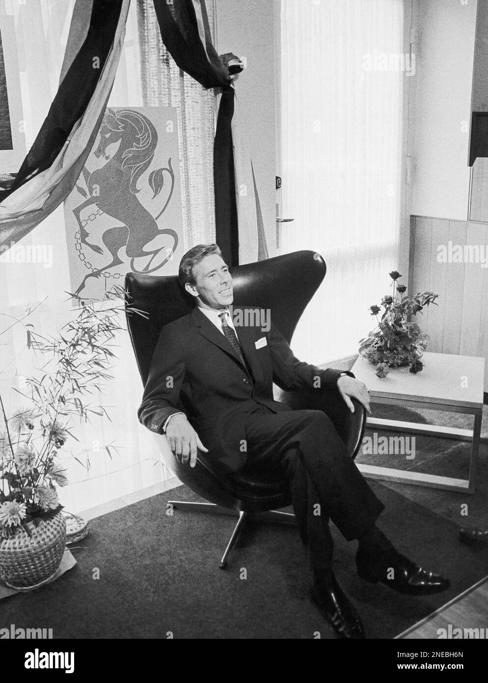Lord Snowdon, husband of Princess Margaret, tries out a new chair ...