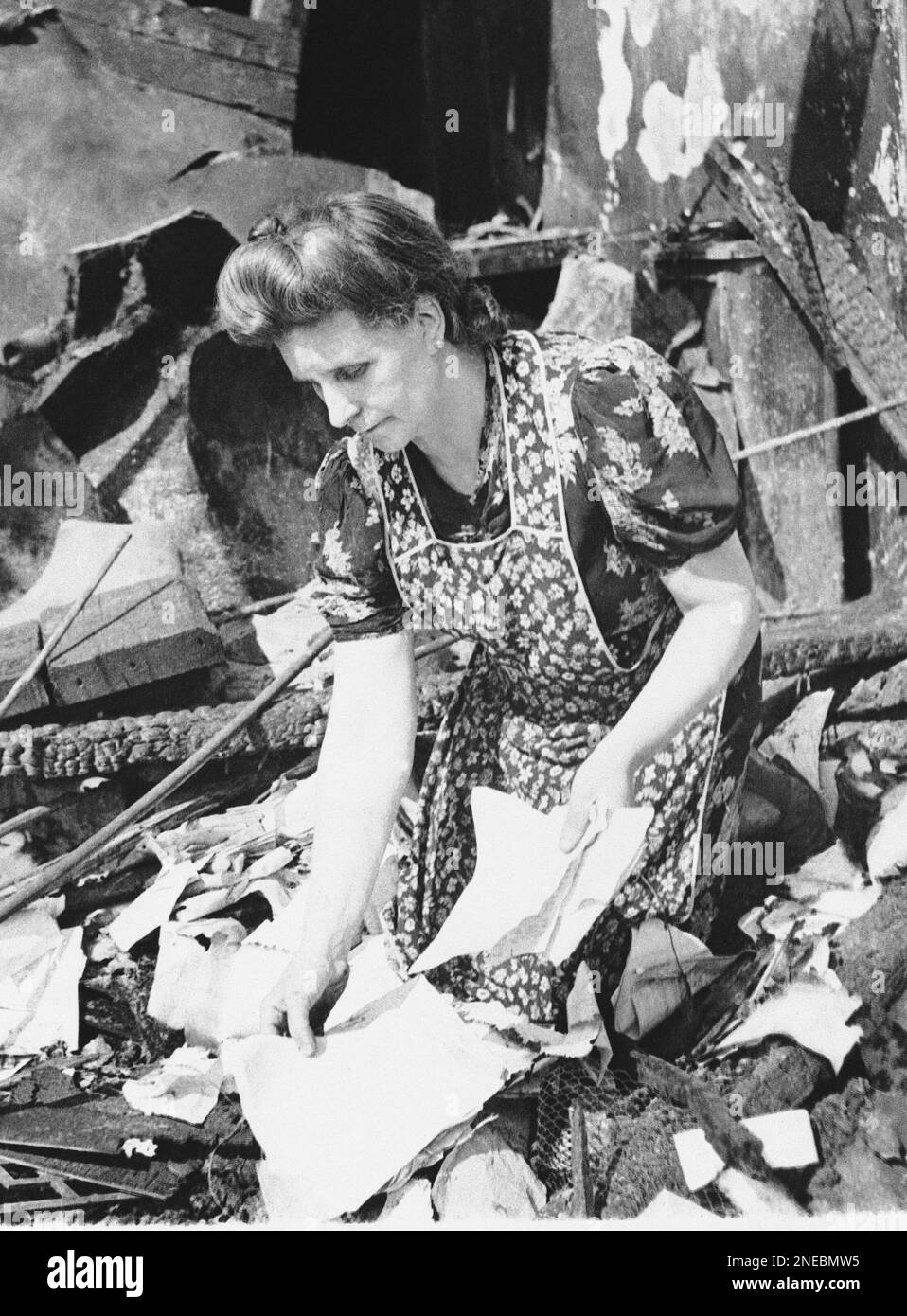 Mrs. Mary Oates, whose home has been blitzed three times in the past ...
