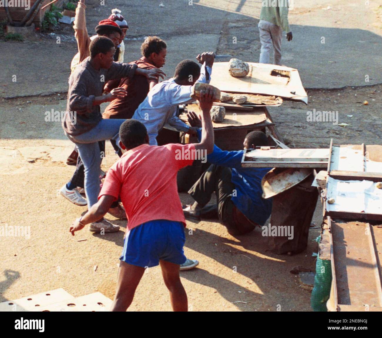 Lindsay Tshabalala, right, a Zulu beaten and burned to death as a ...