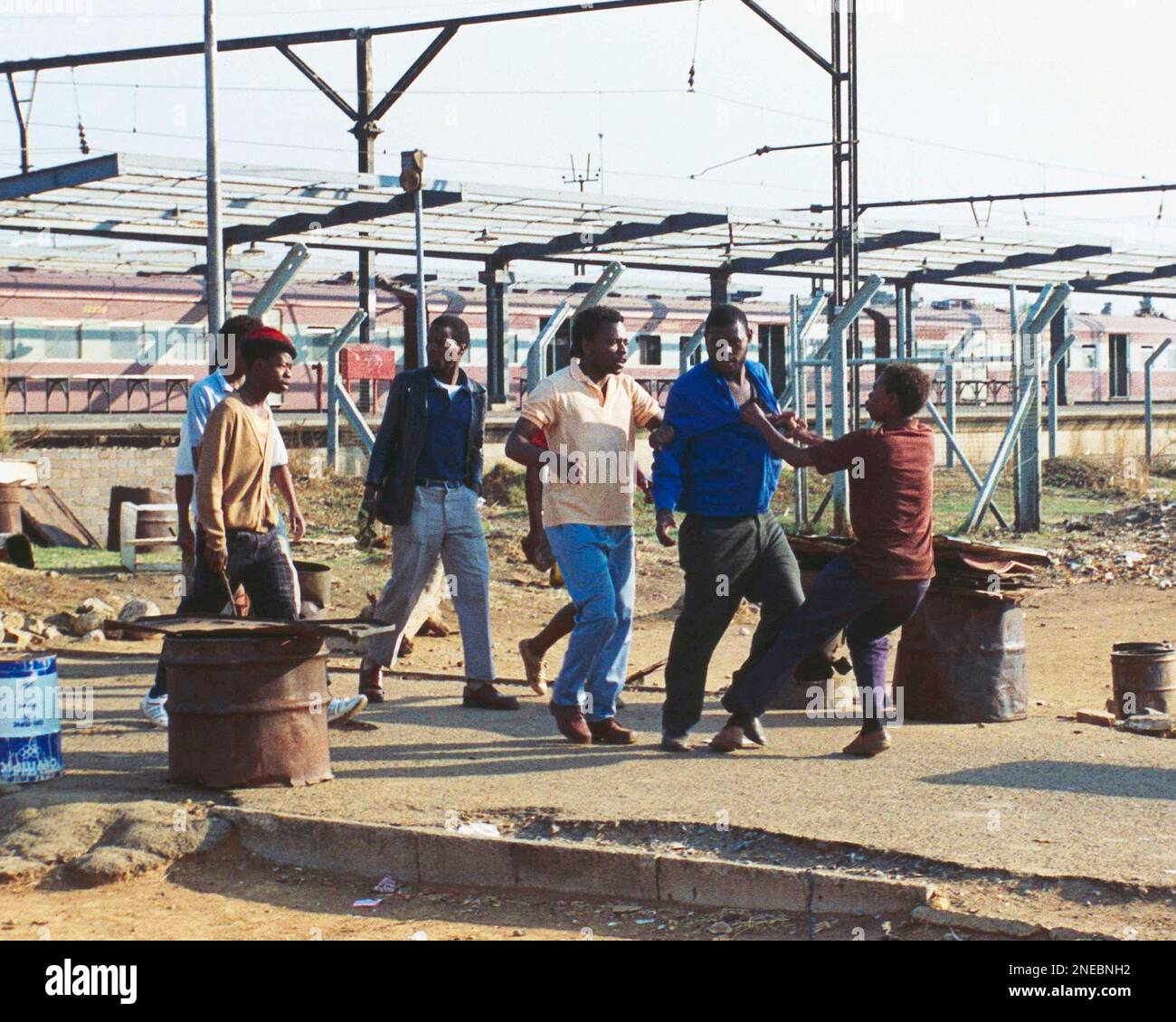 Lindsay Tshabalala, second from right, a Zulu beaten and burned to ...